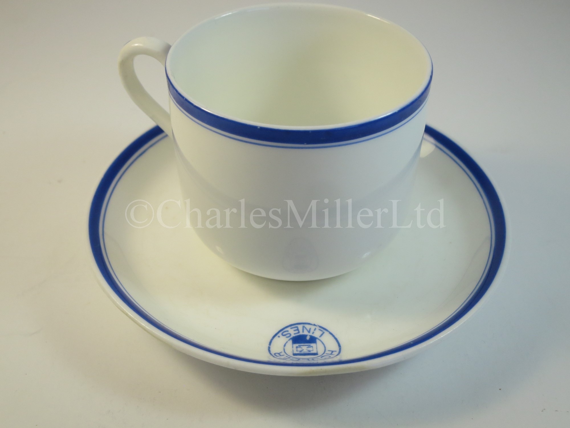Lot 62 - A Houlder Lines coffee cup and saucer